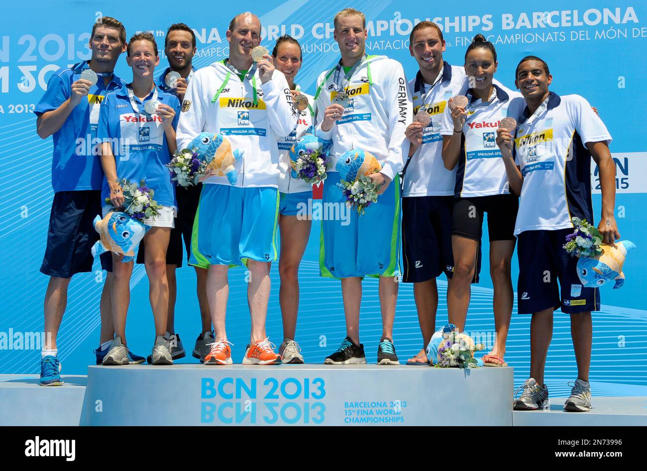Medalists from the 5km team open water swim event from left, silver ...