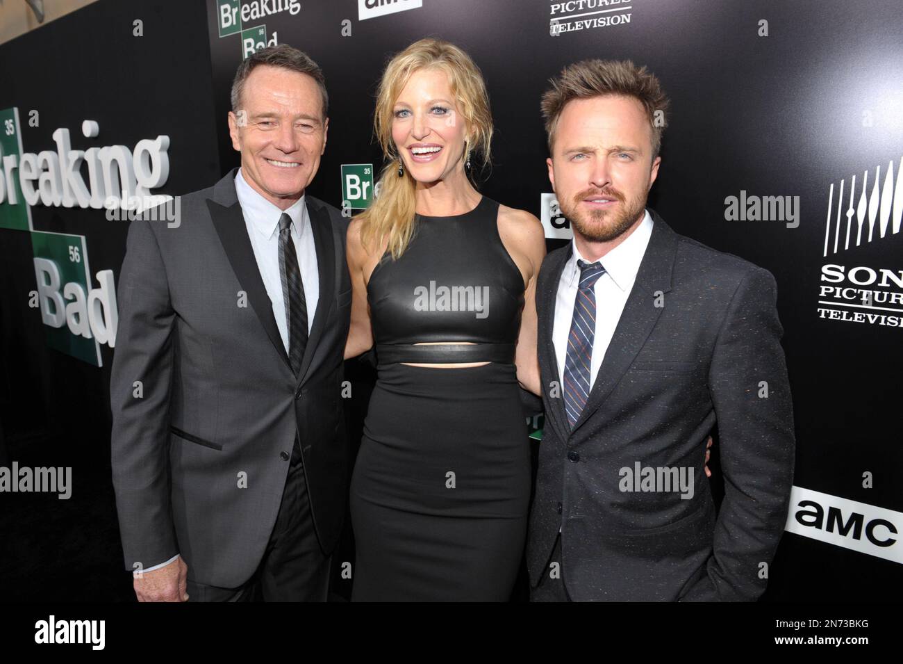 From left, actors Bryan Cranston, Anna Gunn and Aaron Paul attend AMC's ...