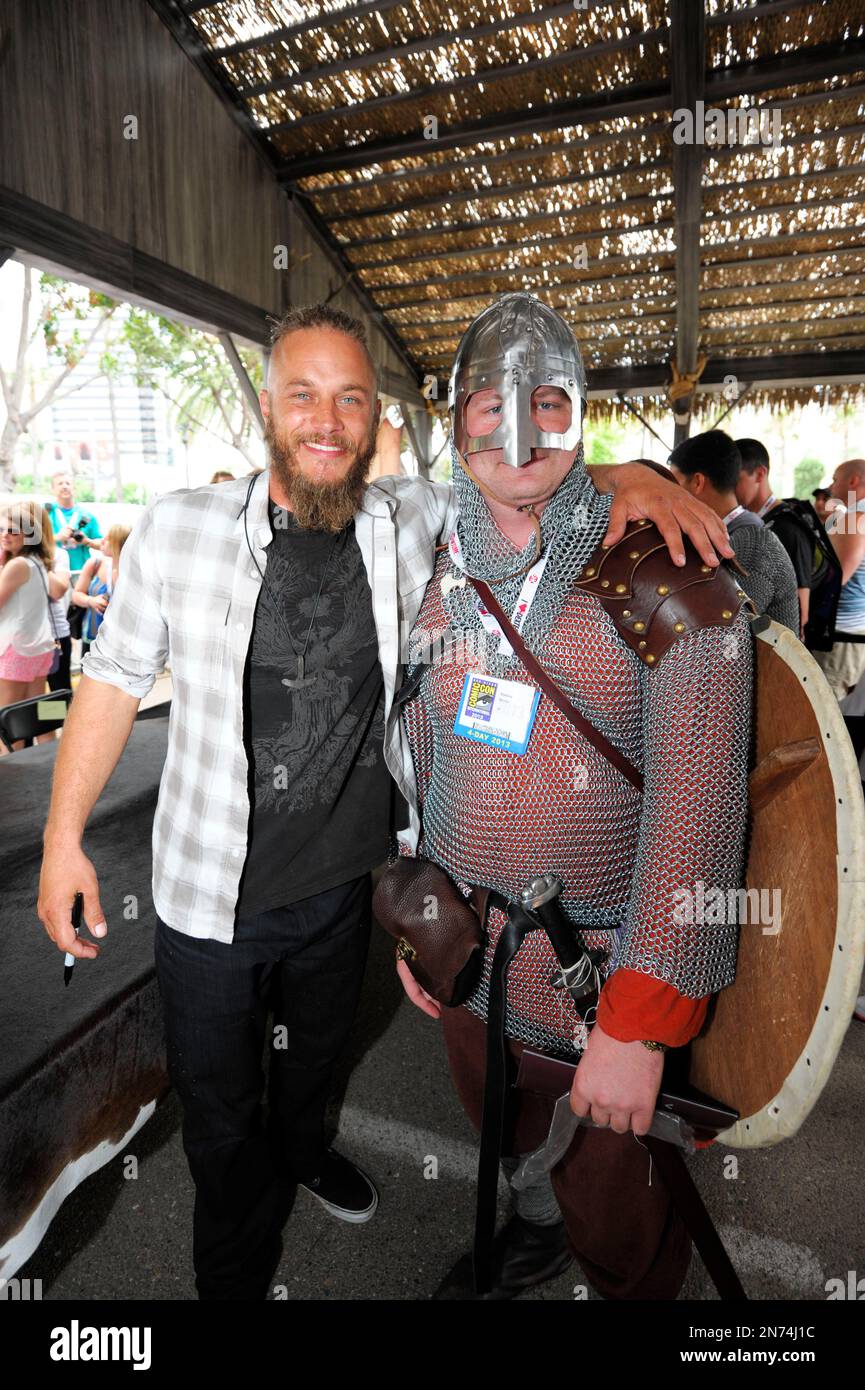 Travis Fimmel of HISTORY's "Vikings", left, poses with a fan at All ...