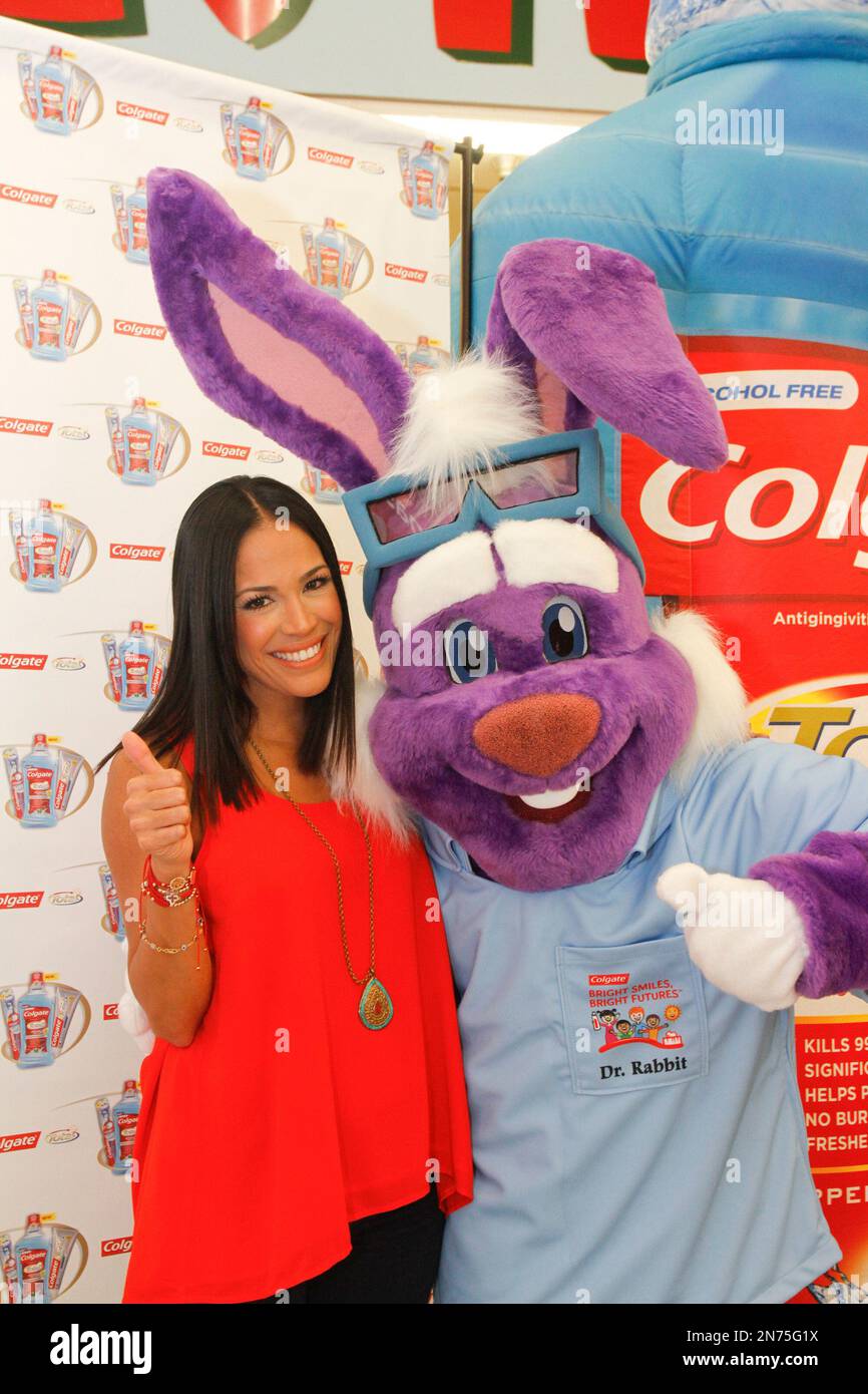 IMAGE DISTRIBUTED FOR COLGATE-PALMOLIVE - Karla Martinez poses with Dr ...
