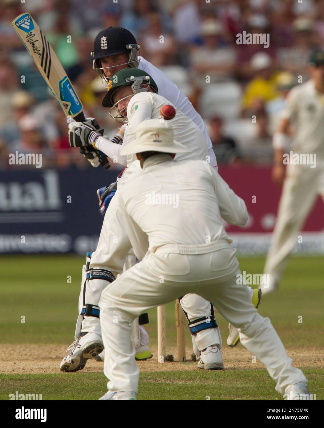 England's Stuart Broad, top, nicks a catch past Australia's ...
