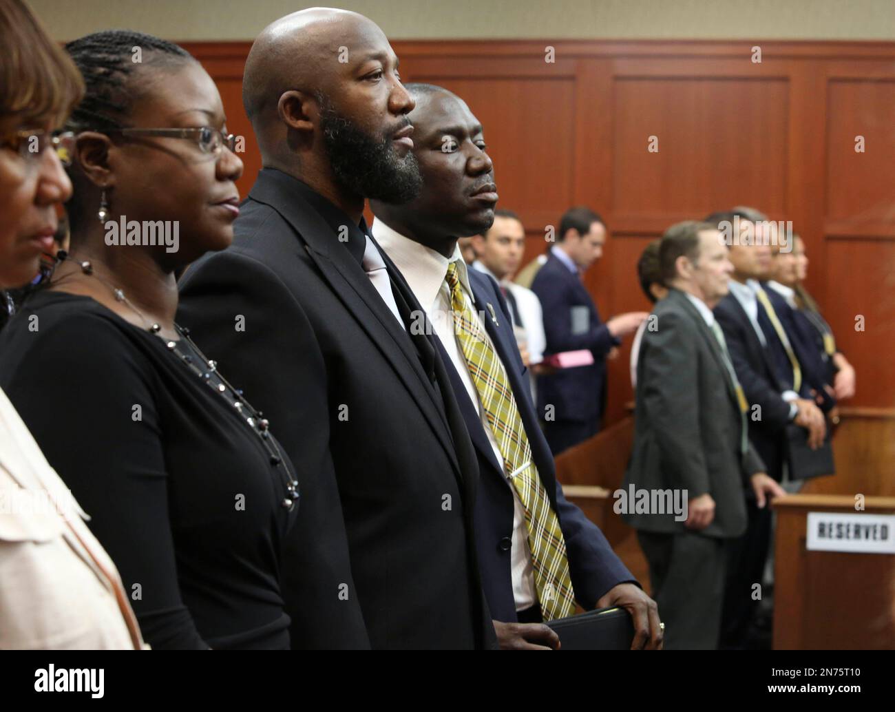 Trayvon Martin's parents Sabrina Fulton and Tracy Martin stand following the state's closing ...