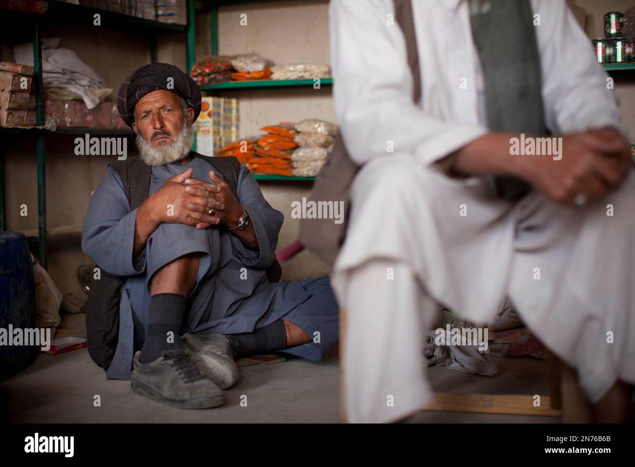 Mohammed Nabi, left, whose son, Mohammed Hasan, was arrested by U.S ...