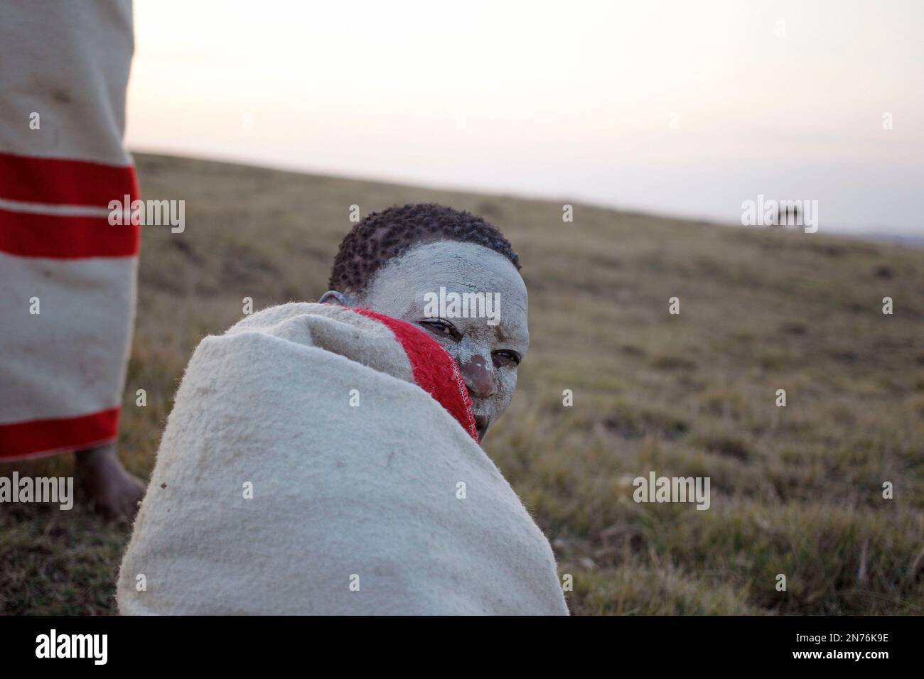 A Xhosa boy covered with a blanket take part in a traditional Xhosa ...
