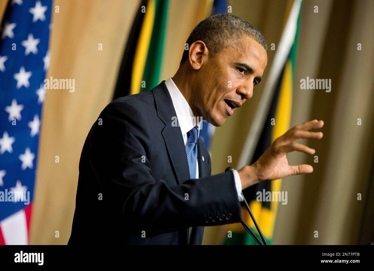 U.S. President Barack Obama gestures during a news conference with ...