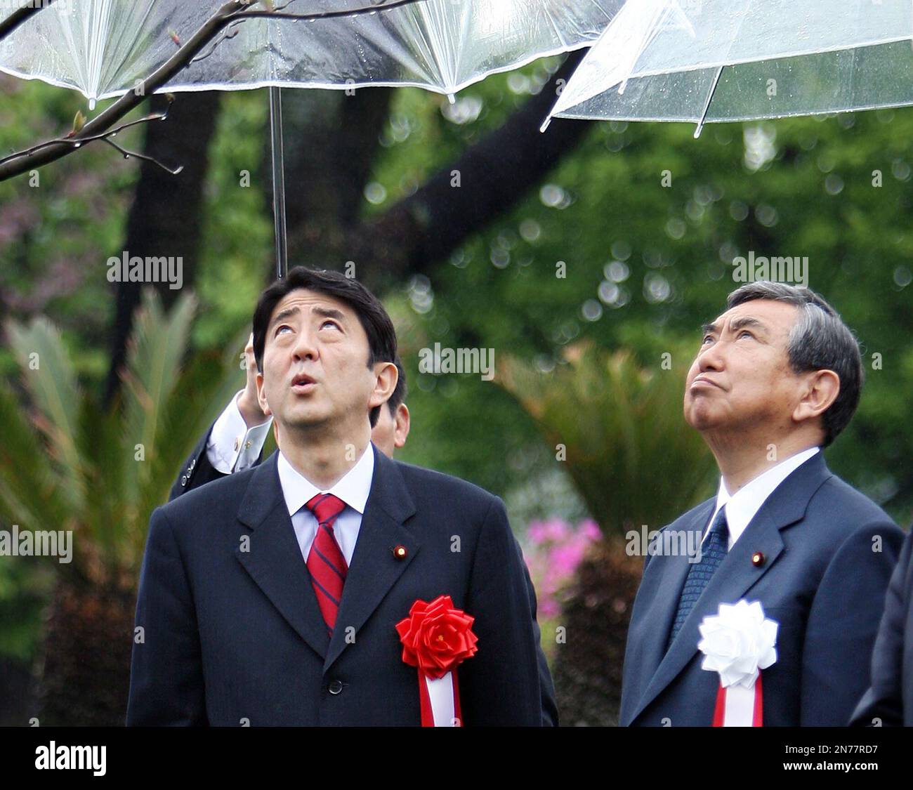 FILE - In this April 25, 2007 file photo, then-Japanese Prime Minister Shinzo Abe, left, and ...