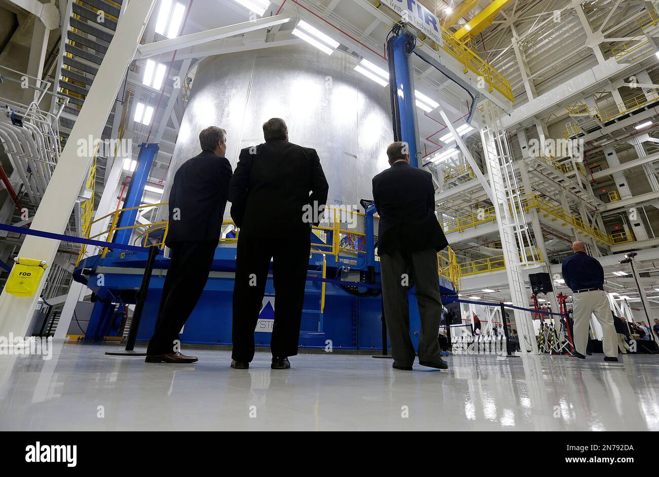 Executives look at the new vertical weld center at NASA's Michoud ...