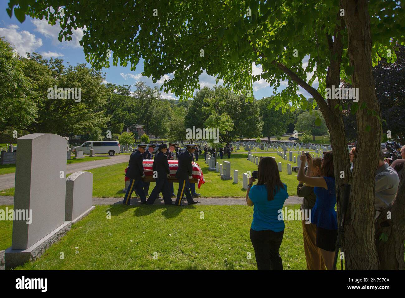 The casket of Lt. Col. Jaimie Leonard is carried by an honor guard as ...