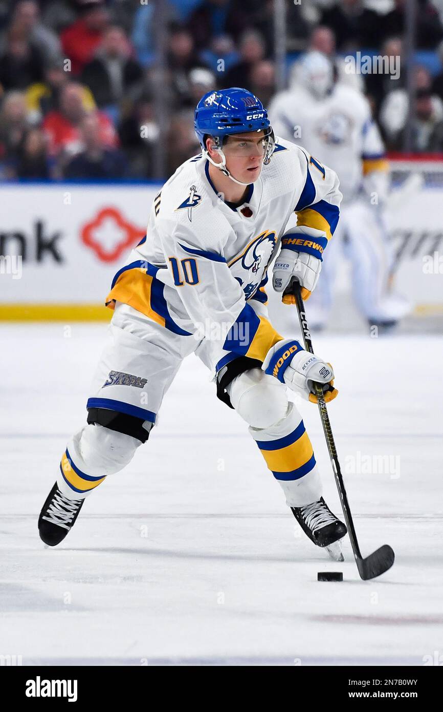 Buffalo Sabres defenseman Henri Jokiharju (10) skates with the puck ...