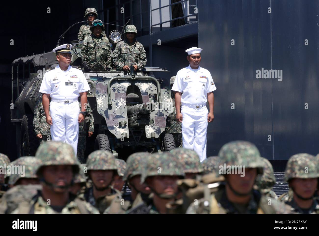 Philippine Marines and Navy sailors prepare for inspection for the ...
