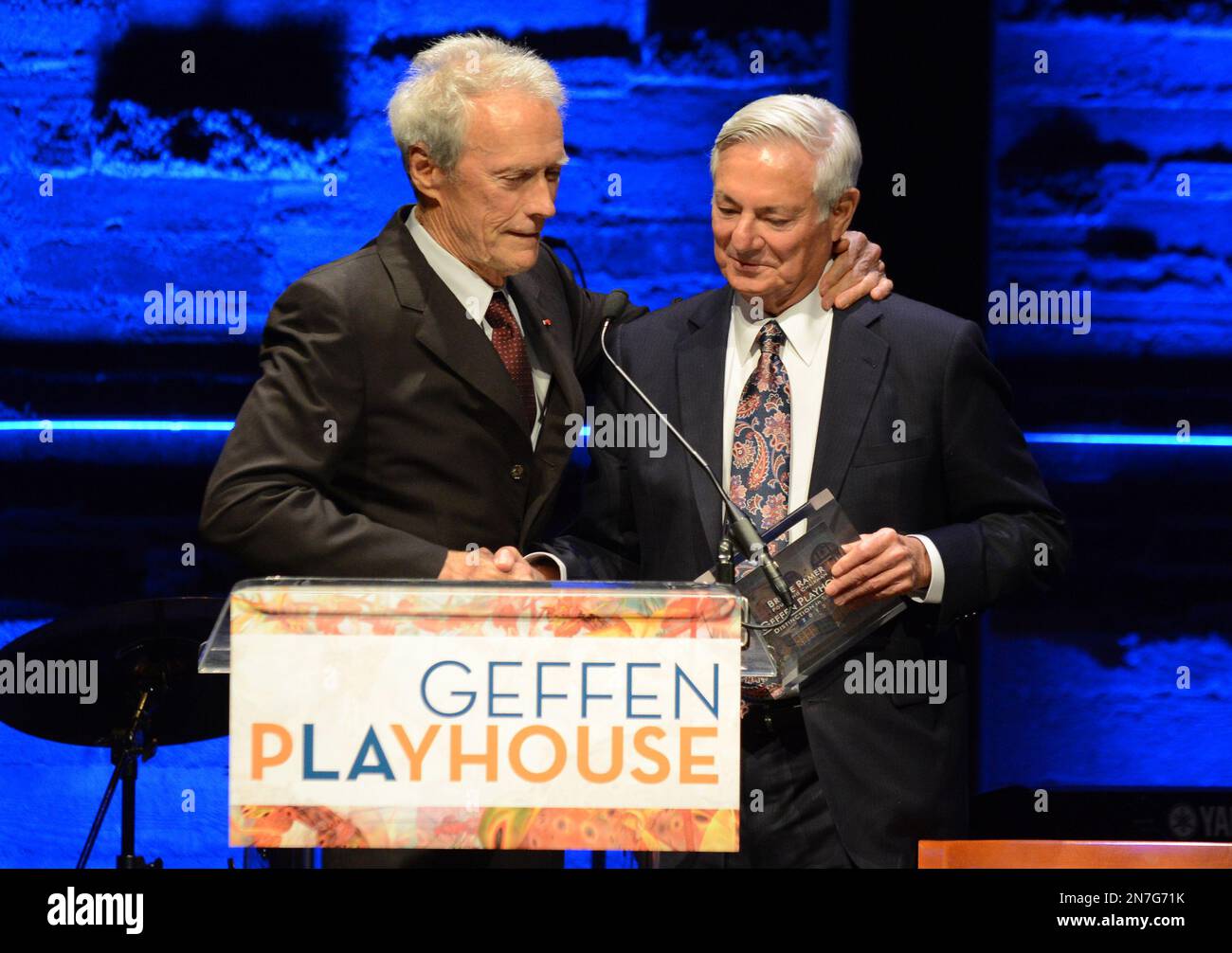 EXCLUSIVE CONTENT - Clint Eastwood, left, presents the distinction in ...