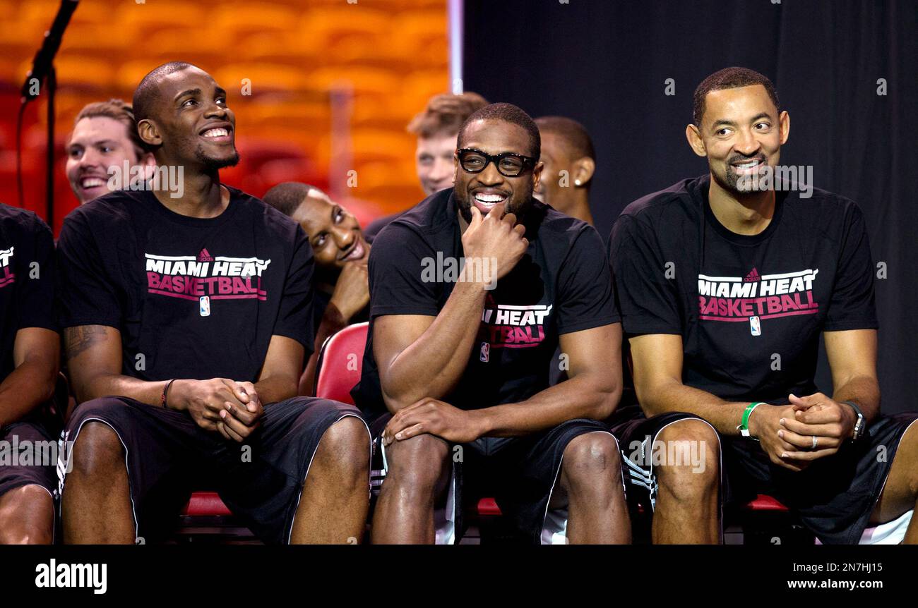 From left, Miami Heat's Jarvis Varnado, Dwyane Wade and Juwan Howard ...