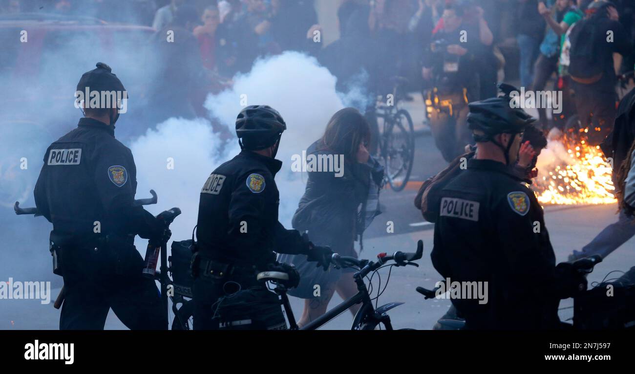 REMOVES EXTRANEOUS INFORMATION - Protesters react as a police flash ...