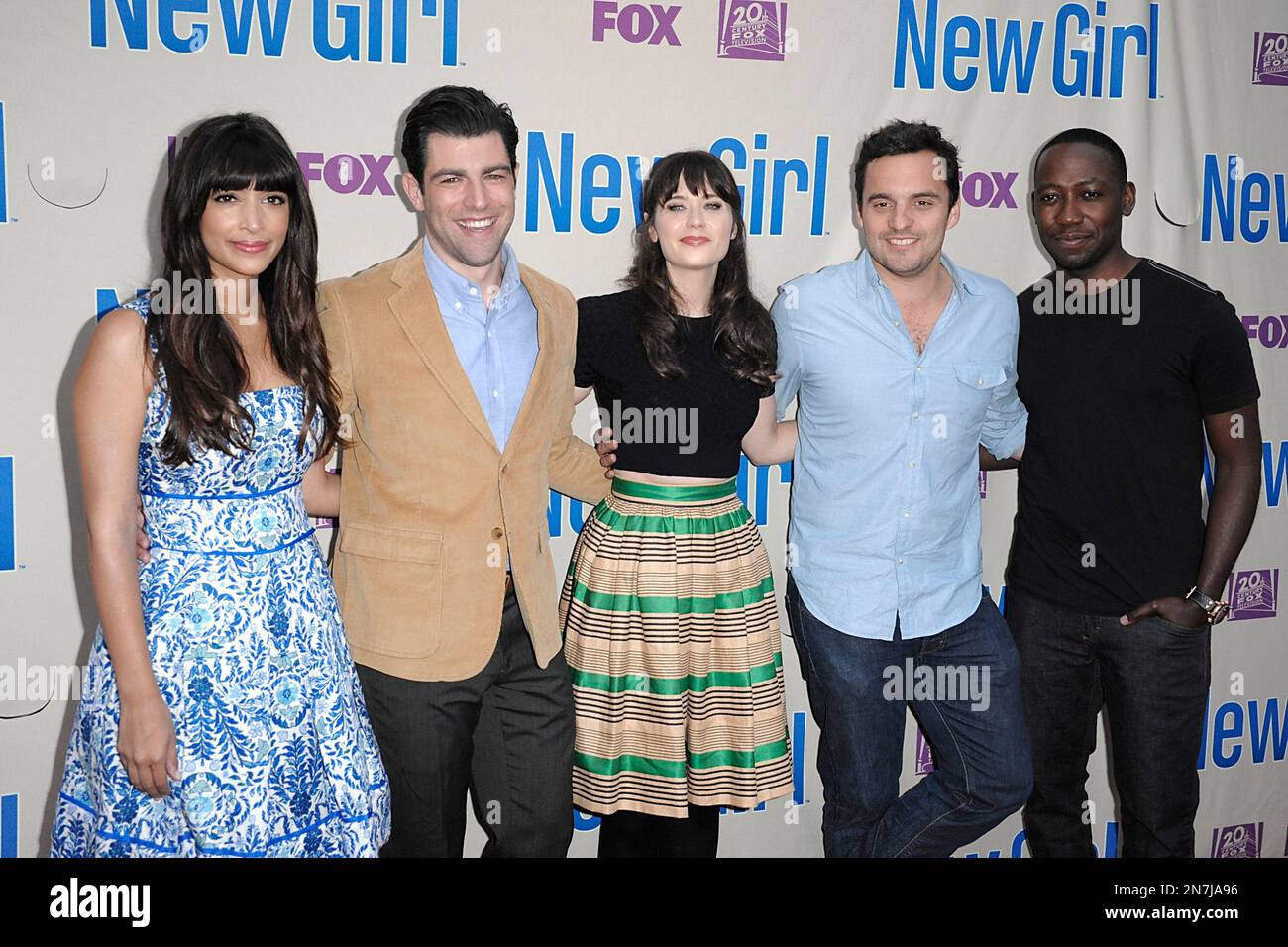 From left to right, actress Hannah Simone, actor Max Greenfield ...