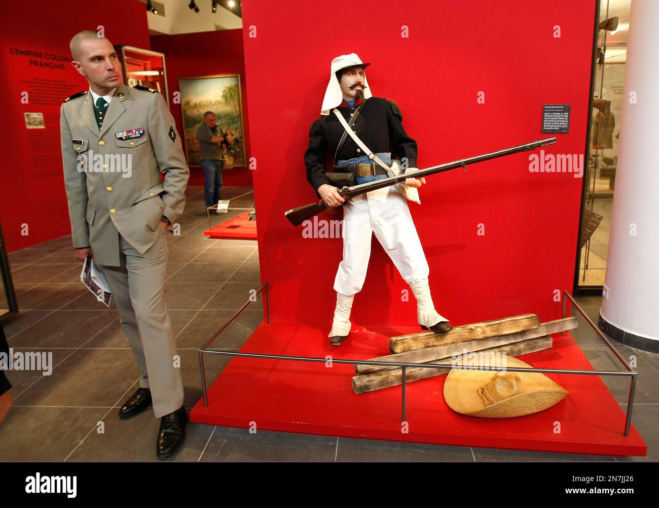 A soldier of French Foreign Legion, left, visits the new Foreign Legion ...