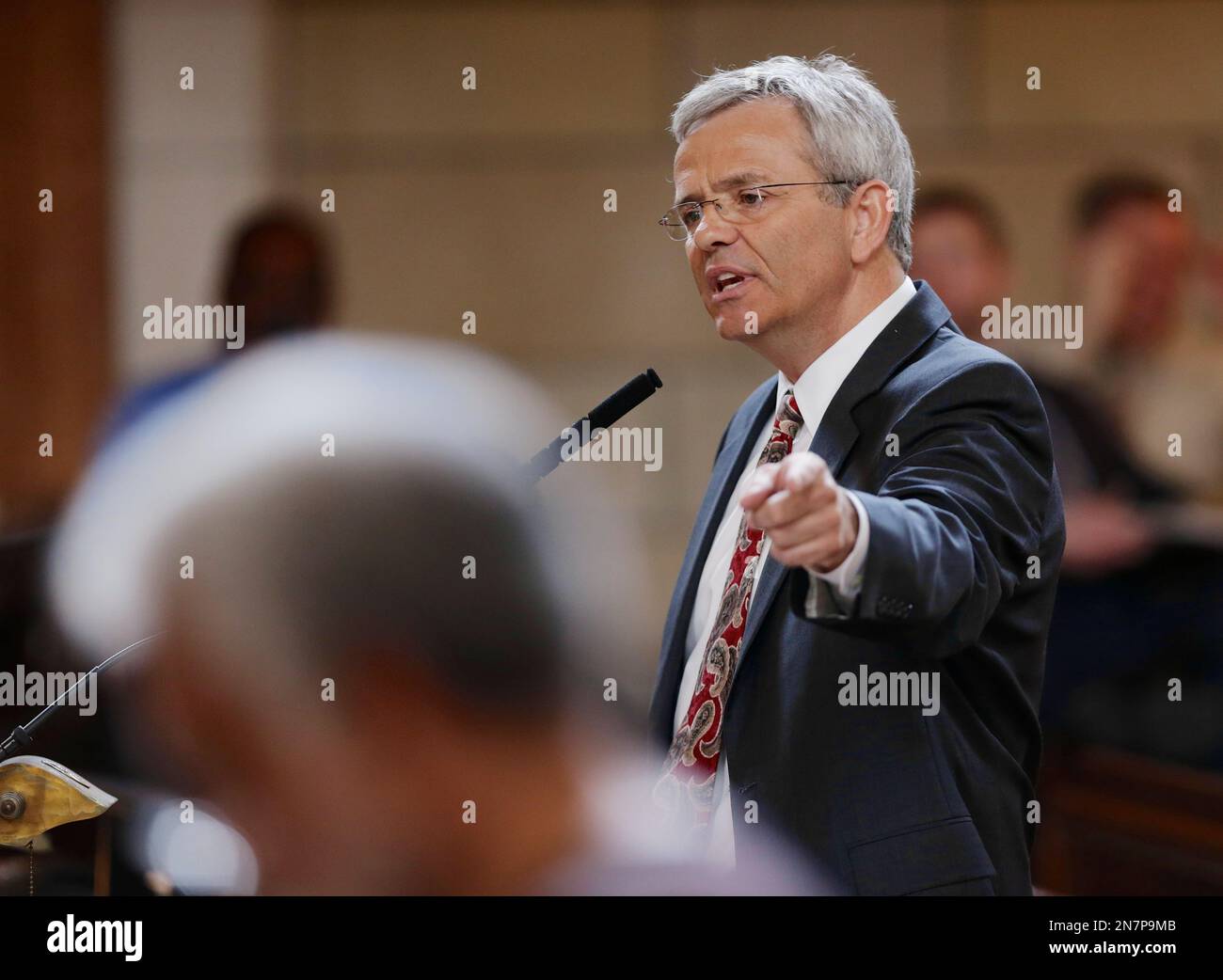 Nebraska state Sen. Steve Lathrop of Omaha points to Sen. Ernie ...