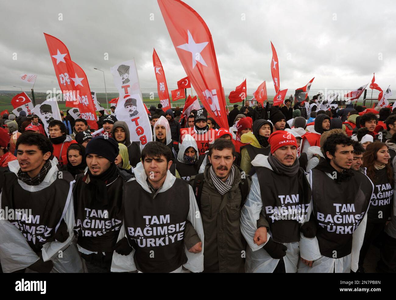 Thousands of Turks, holding national flags and posters of Turkey's ...