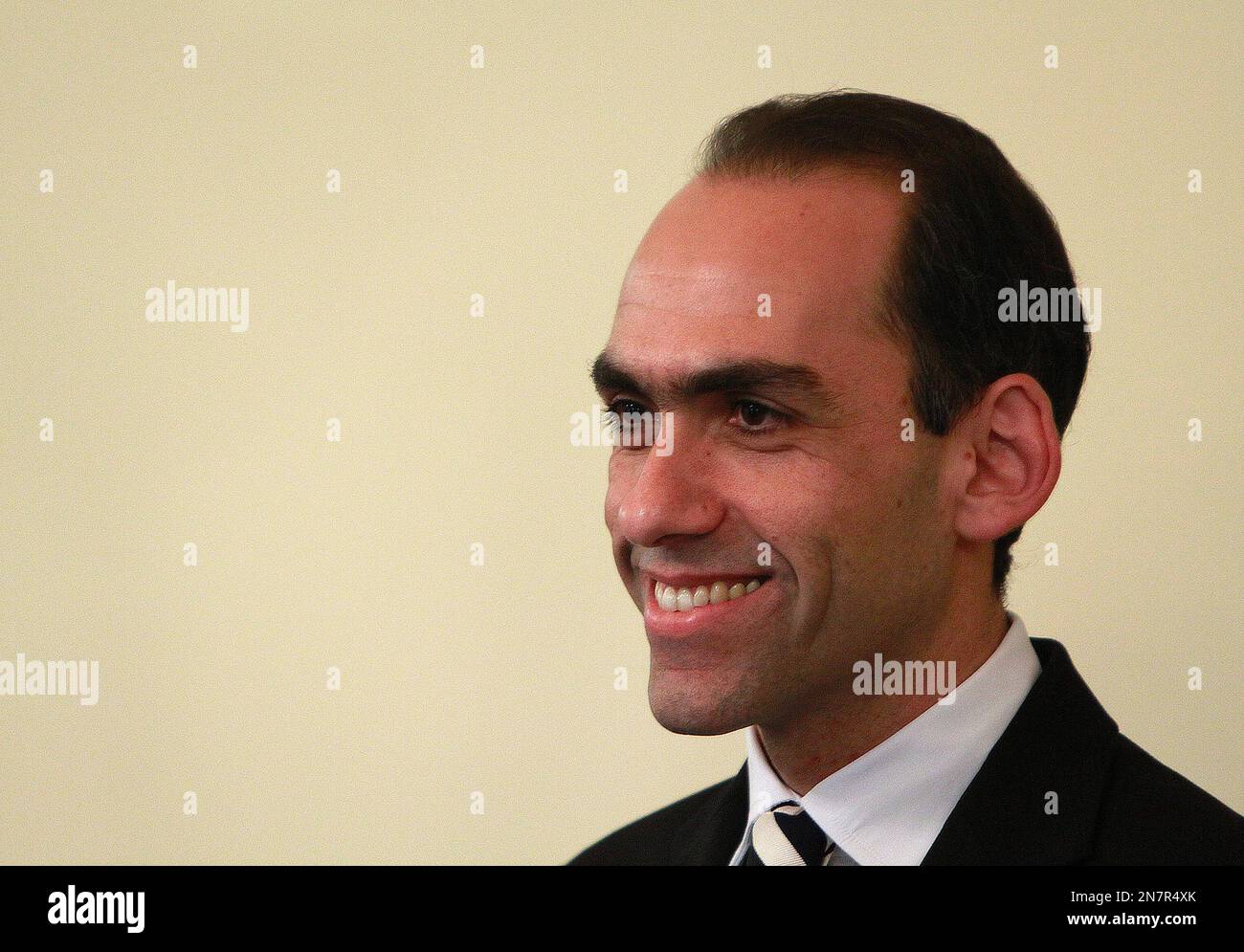 New Finance Minister Harris Georgiades takes the oath of office during ...