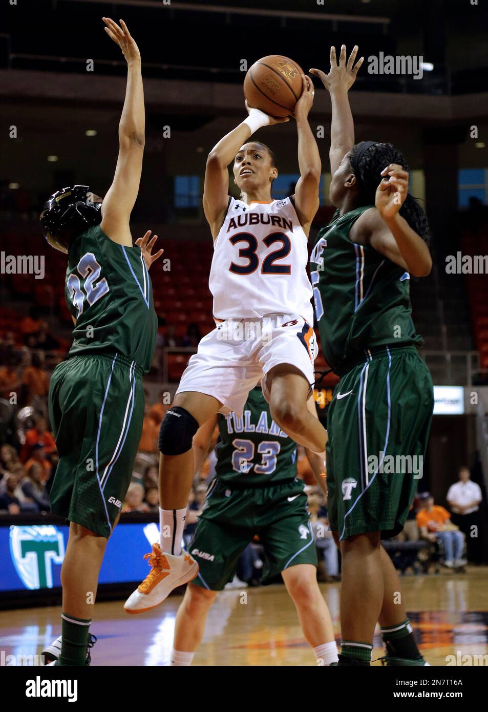 Auburn guard/forward Tyrese Tanner (32) shoots between Tulane guard ...