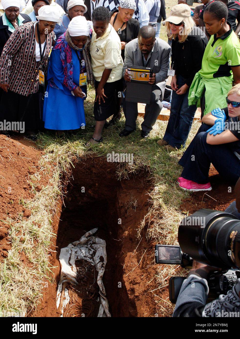 Nomsa Tshabalala, second from left, with relatives surrounding the ...