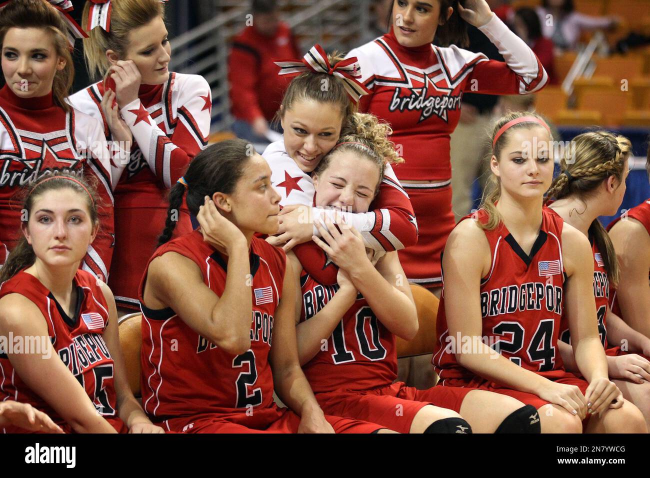 Bridgeport players and cheerleaders celebrate after winning the West ...