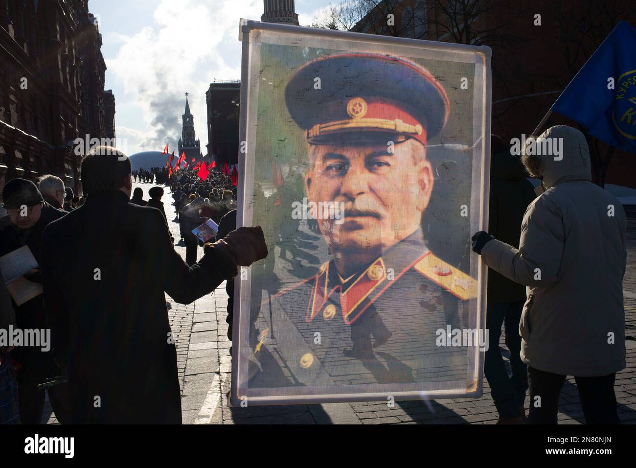 Communist supporters carry a portrait depicting Soviet dictator Josef ...