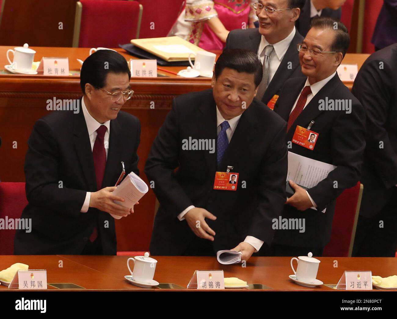 Communist Party chief Xi Jinping, center, Chinese President Hu Jintao ...