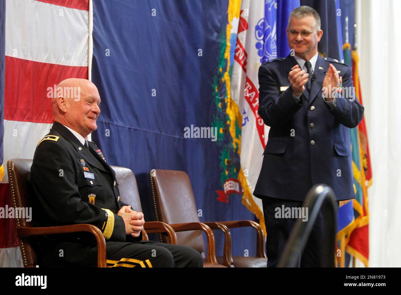 Brigadier Gen. Steven Cray, right, applauds outgoing Adjutant General ...