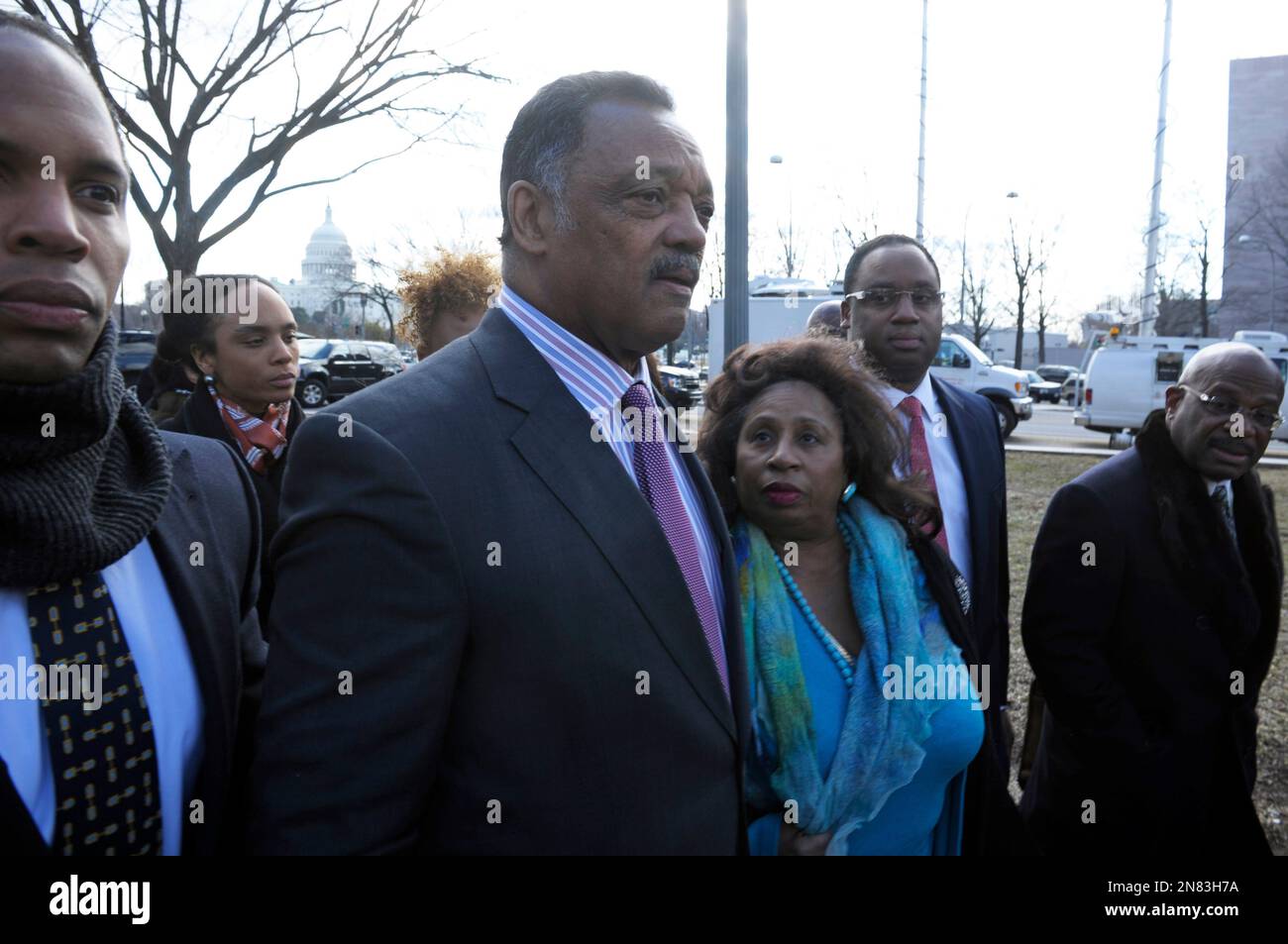 With the Capitol dome in the background, Rev. Jesse Jackson, Sr. and ...