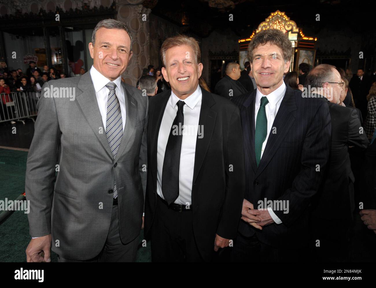 From left, Robert Iger, chairman and CEO of The Walt Disney Company ...