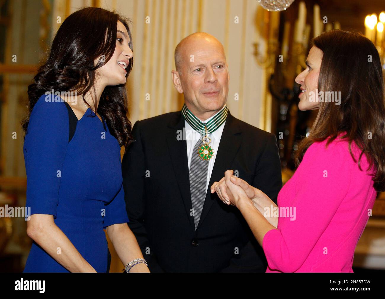 American movie star Bruce Willis, centre, poses for the press with his ...