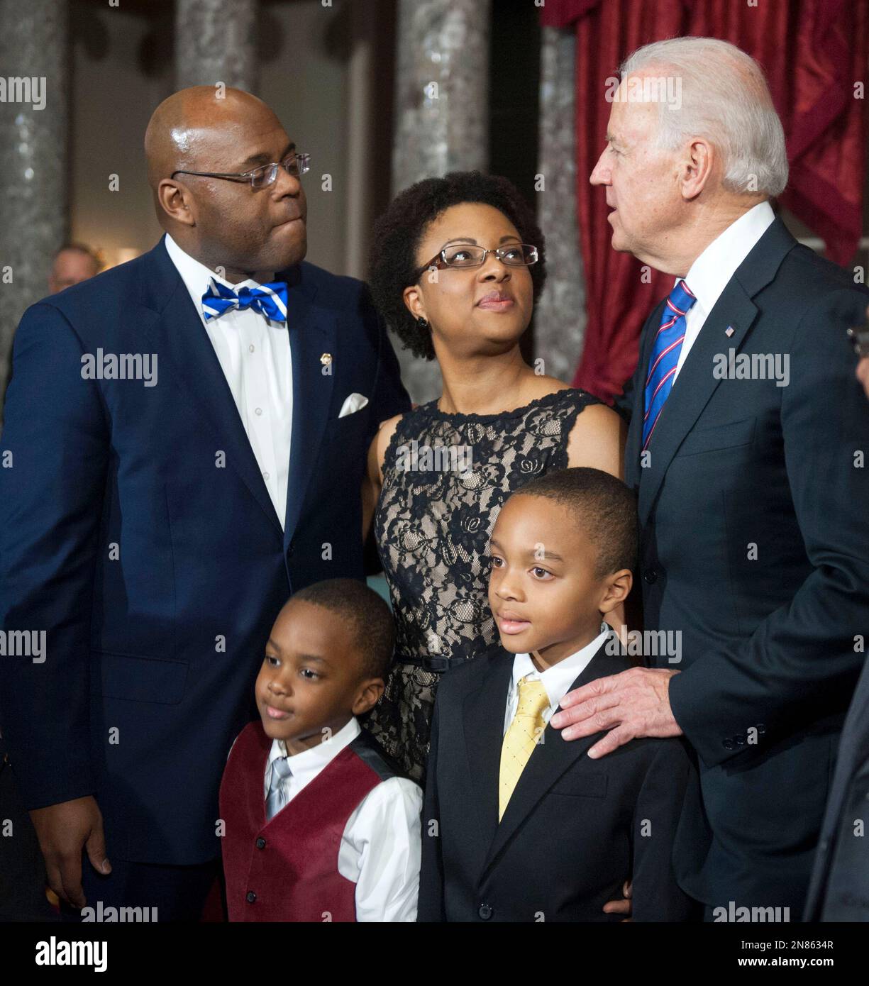 Vice President Joseph Biden, right, talks with Sen. William "Mo" Cowan ...