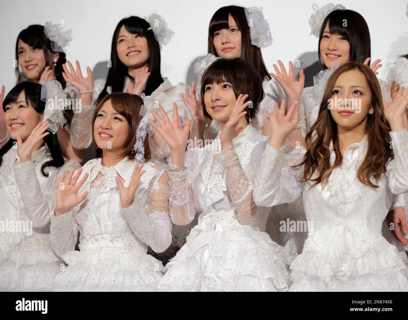 Members of Japanese girls pop gourp AKB48, from left in first row, Mayu Watanabe, Minami ...