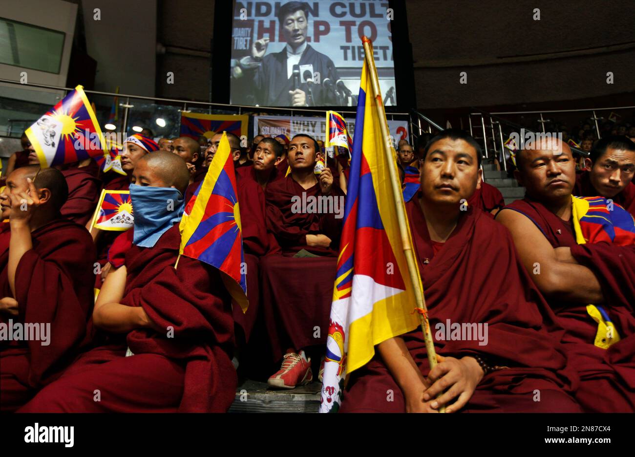 Exiled Tibetan Buddhist monks listen to the Prime Minister of the ...