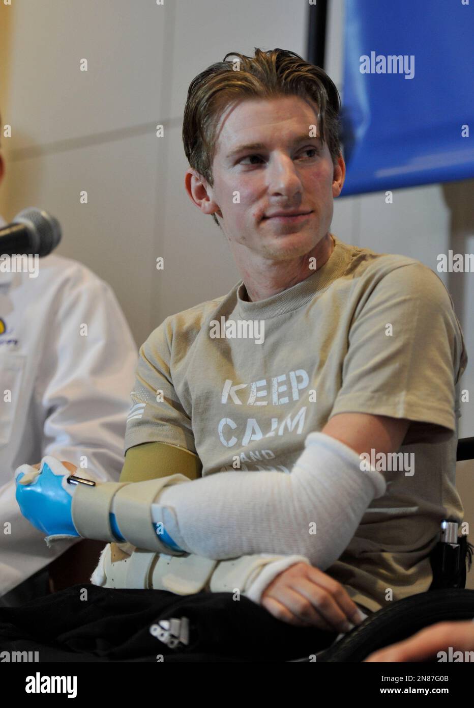 Retired Infantryman Brendan M. Marrocco listens during a news ...