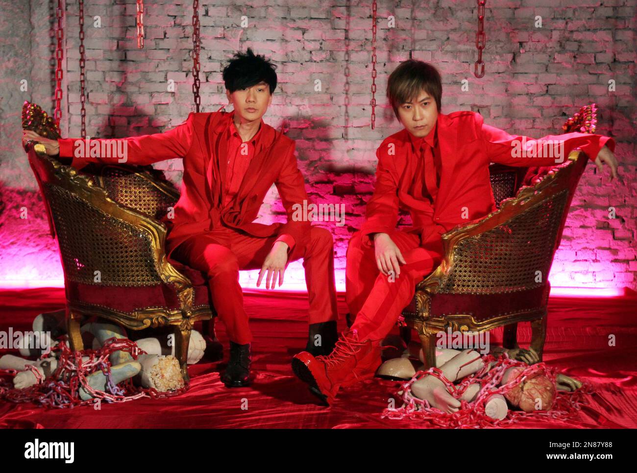 Singapore pop singer Lin Junjie, left, and Ashin of Taiwanese pop group ...