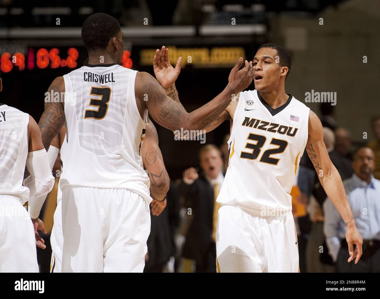 Missouri's Jabari Brown, right, celebrates with teammate Tony Criswell ...