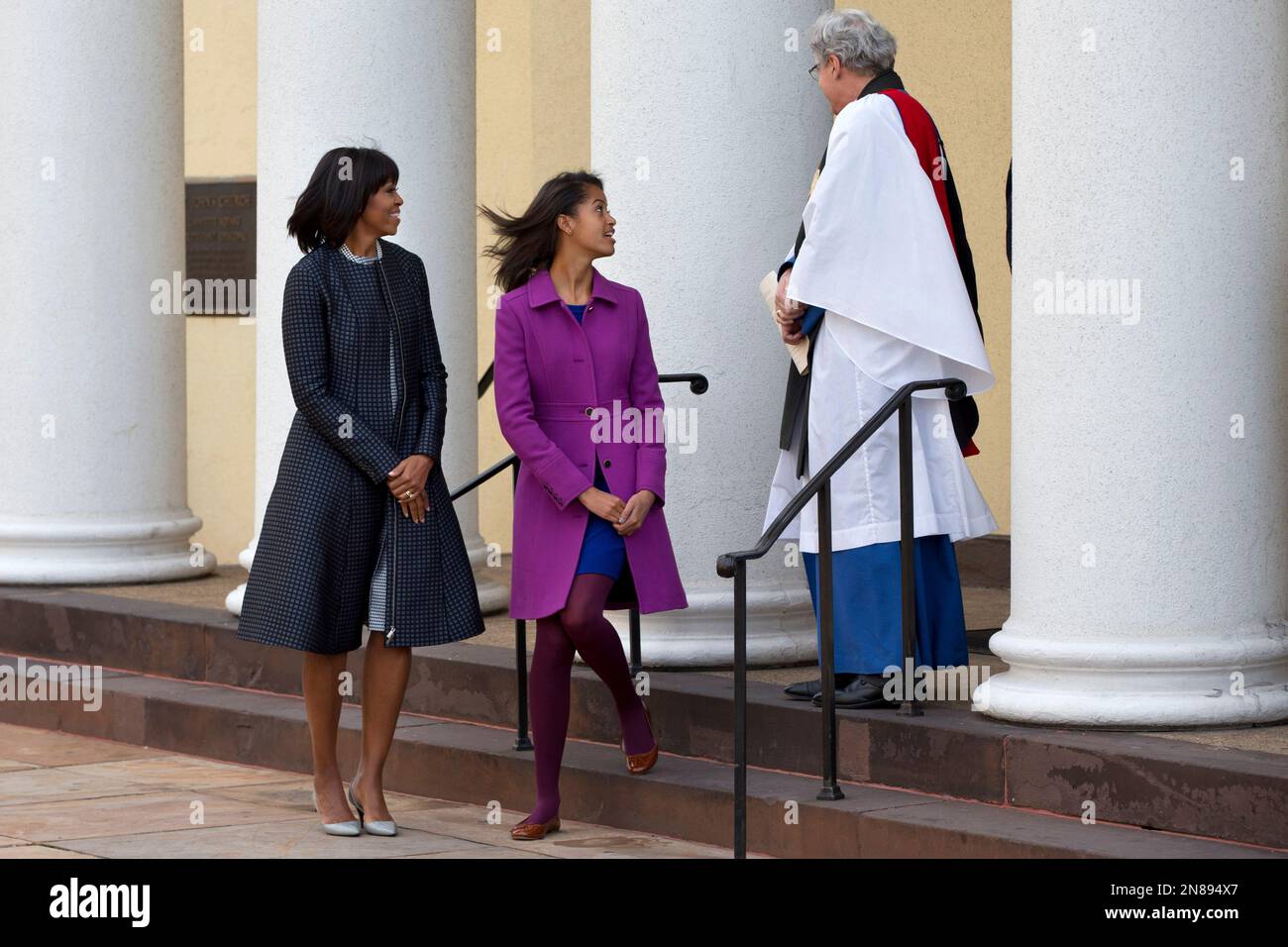 First lady Michelle Obama and daughter Malia say goodbye to Rev. Luis ...
