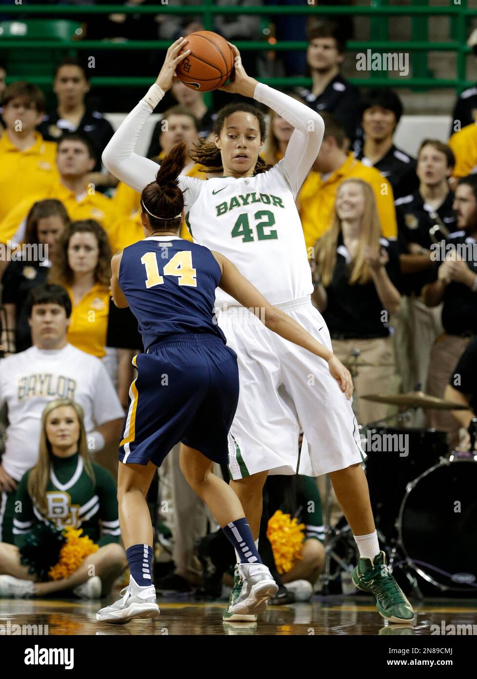West Virginia's Jess Harlee (14) defends as Baylor's Brittney Griner ...