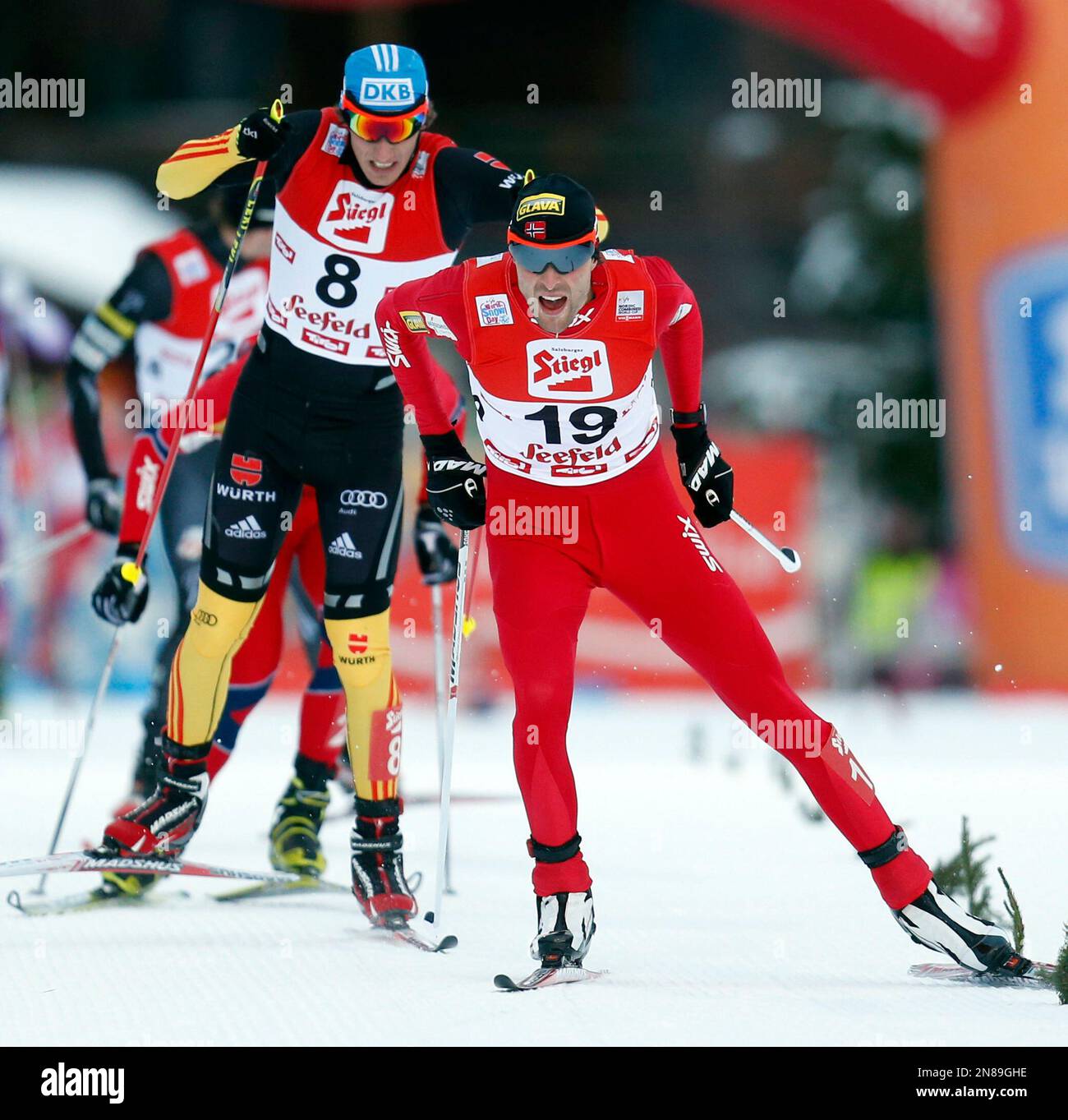 Norway's Magnus Moan, front, and Germany's Tino Edelmann compete in the ...