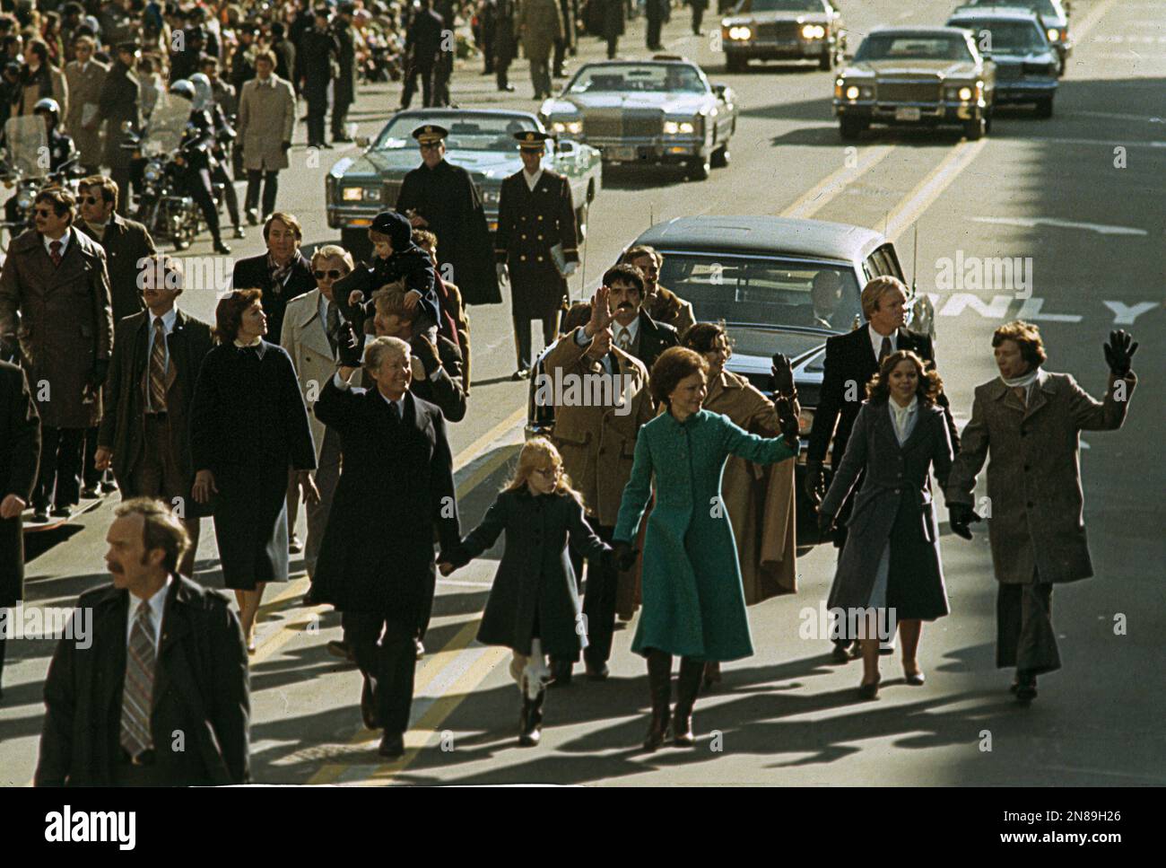 FILE - In this Jan. 20, 1977, file photo, President Jimmy Carter walks ...