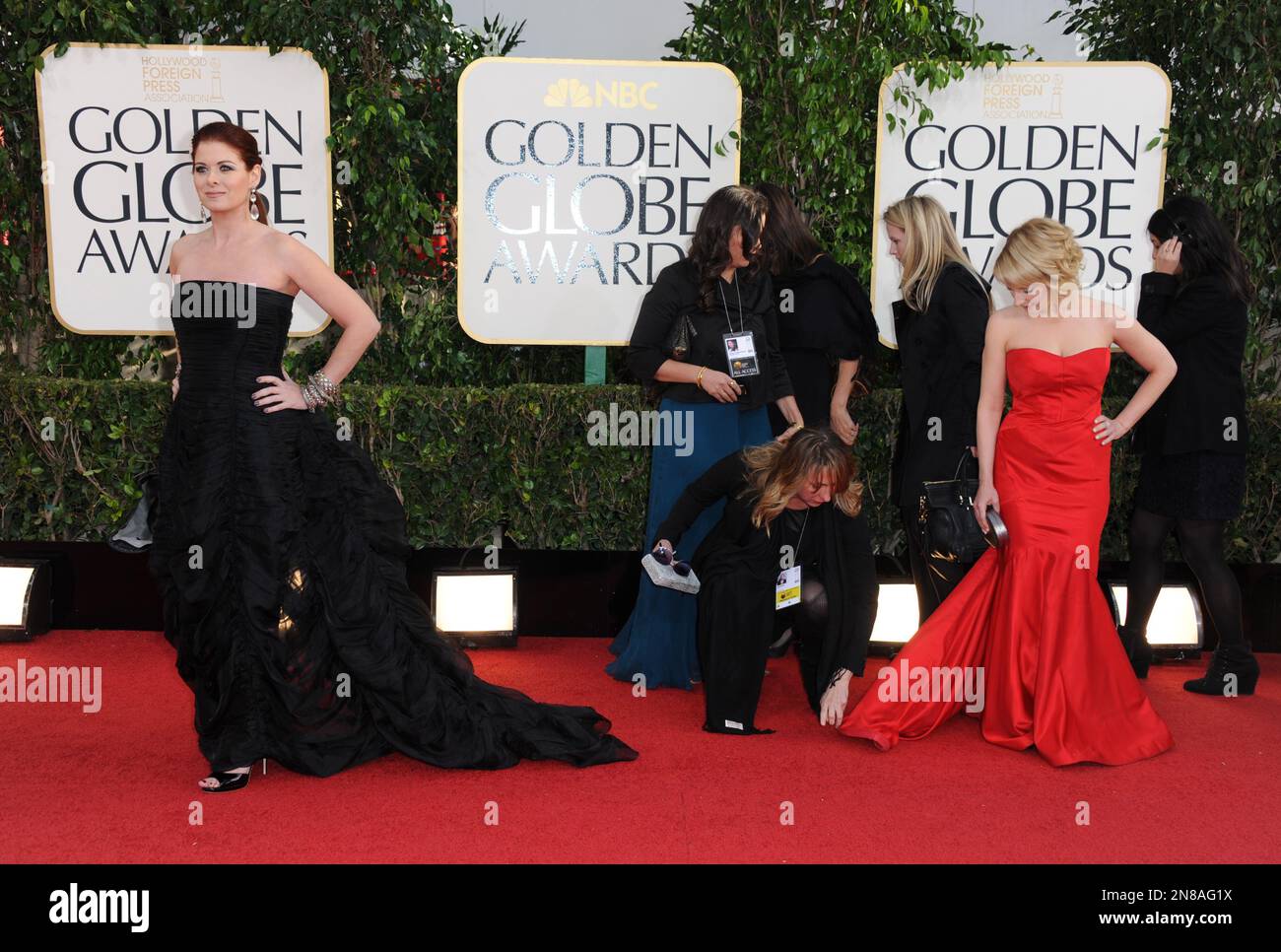 Actress Debra Messing, left, and Melissa Rauch arrive at the 70th ...