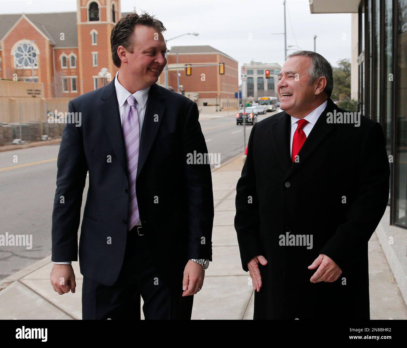 Former Oklahoma Senate President Pro-Tem Mike Morgan, right, walks with ...