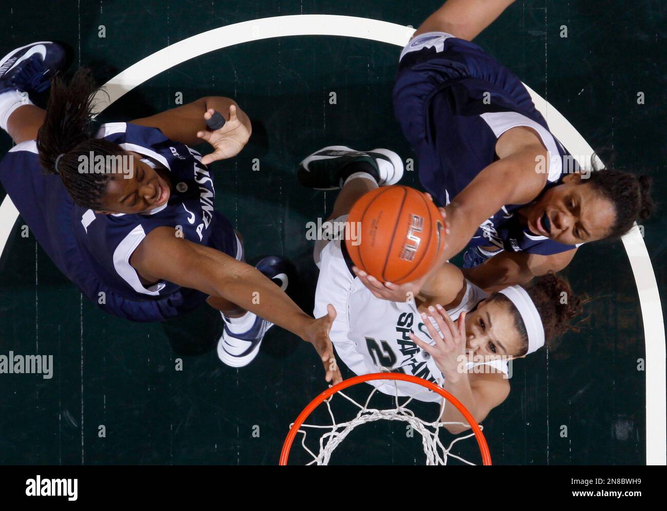 Michigan State's Klarissa Bell, bottom, and Penn State's Candice Agee ...