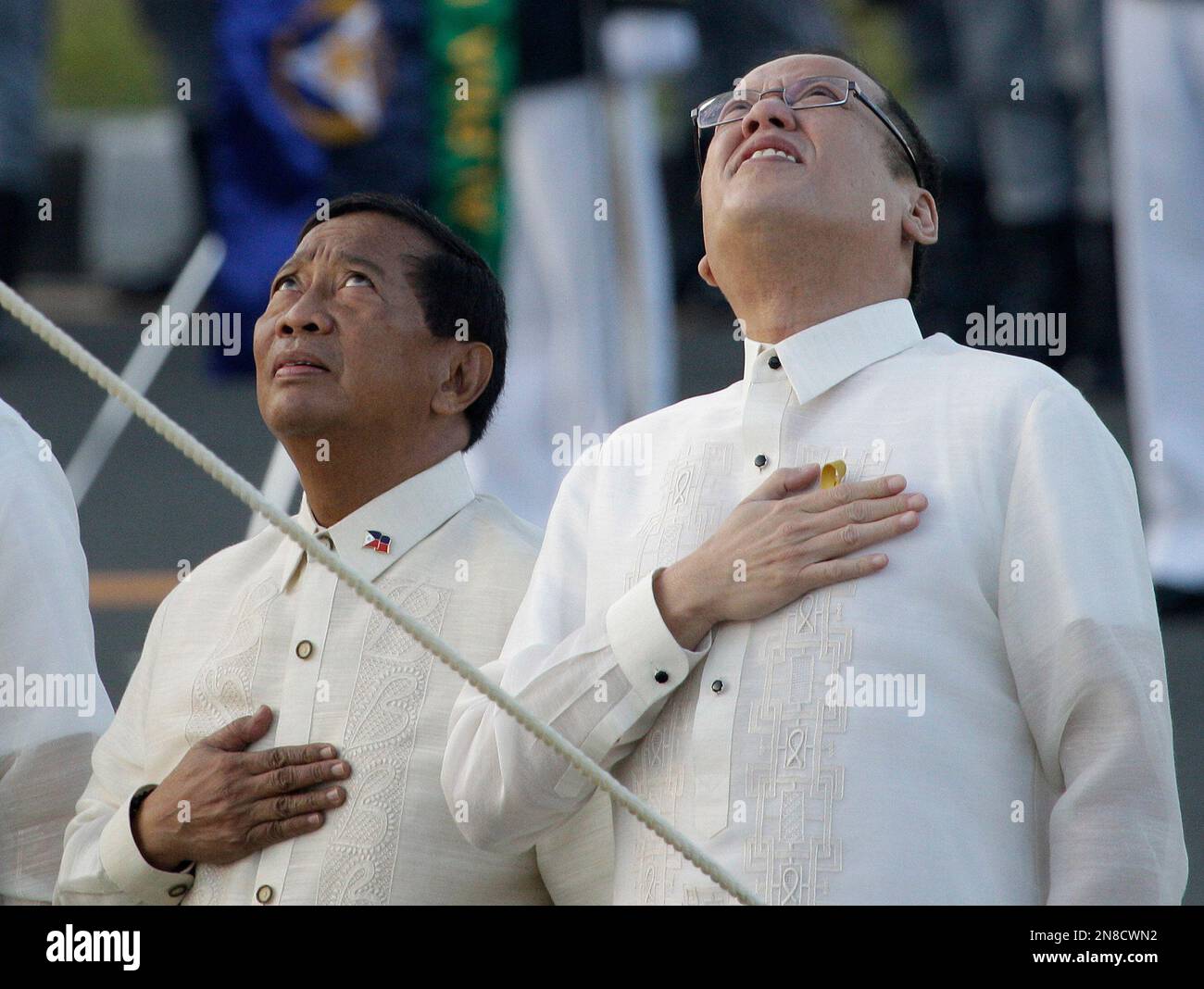 Philippine President Benigno Aquino III, right, looks at the Philippine ...