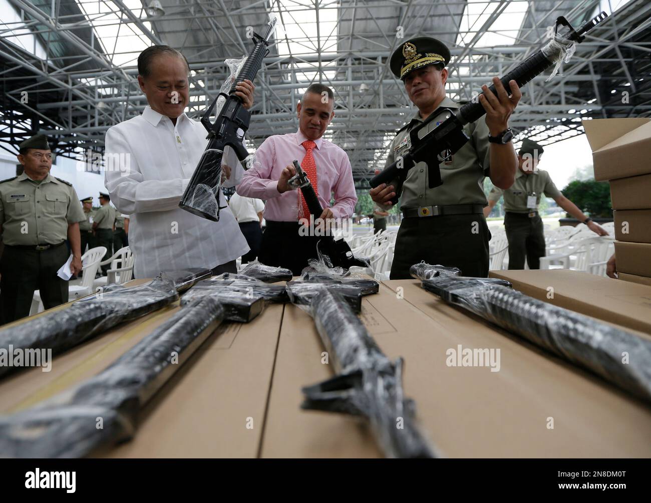 Armed Forces of the Philippines Chief Gen. Jessie Dellosa, right front ...