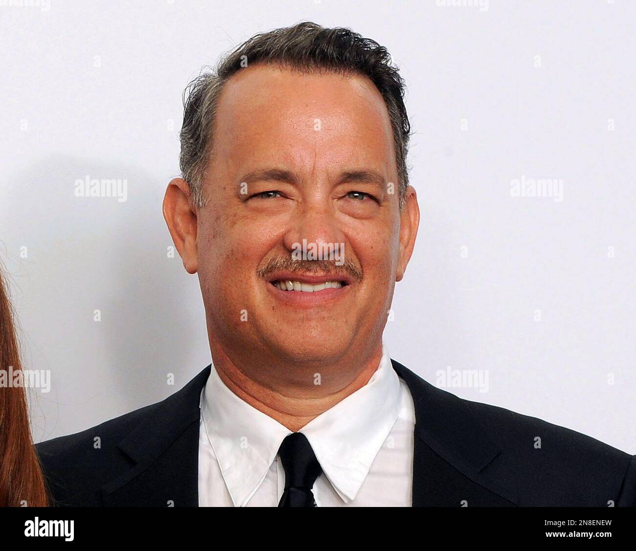 FILE - This Sept. 23, 2012 file photo shows Tom Hanks backstage at the ...