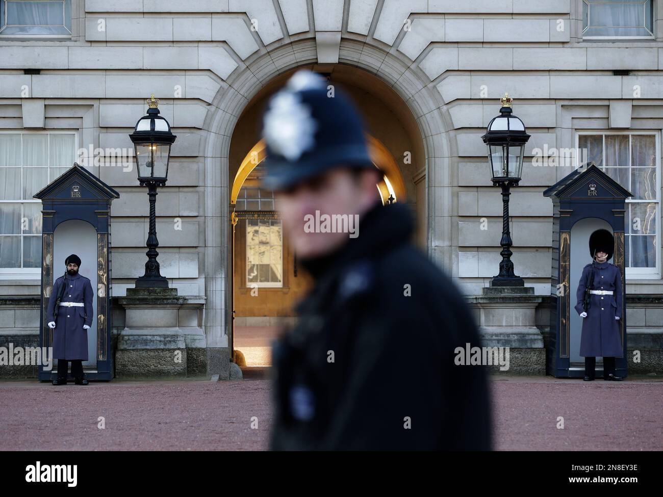 A British police officer walks past as Jatinderpal Singh Bhullar, 25 ...