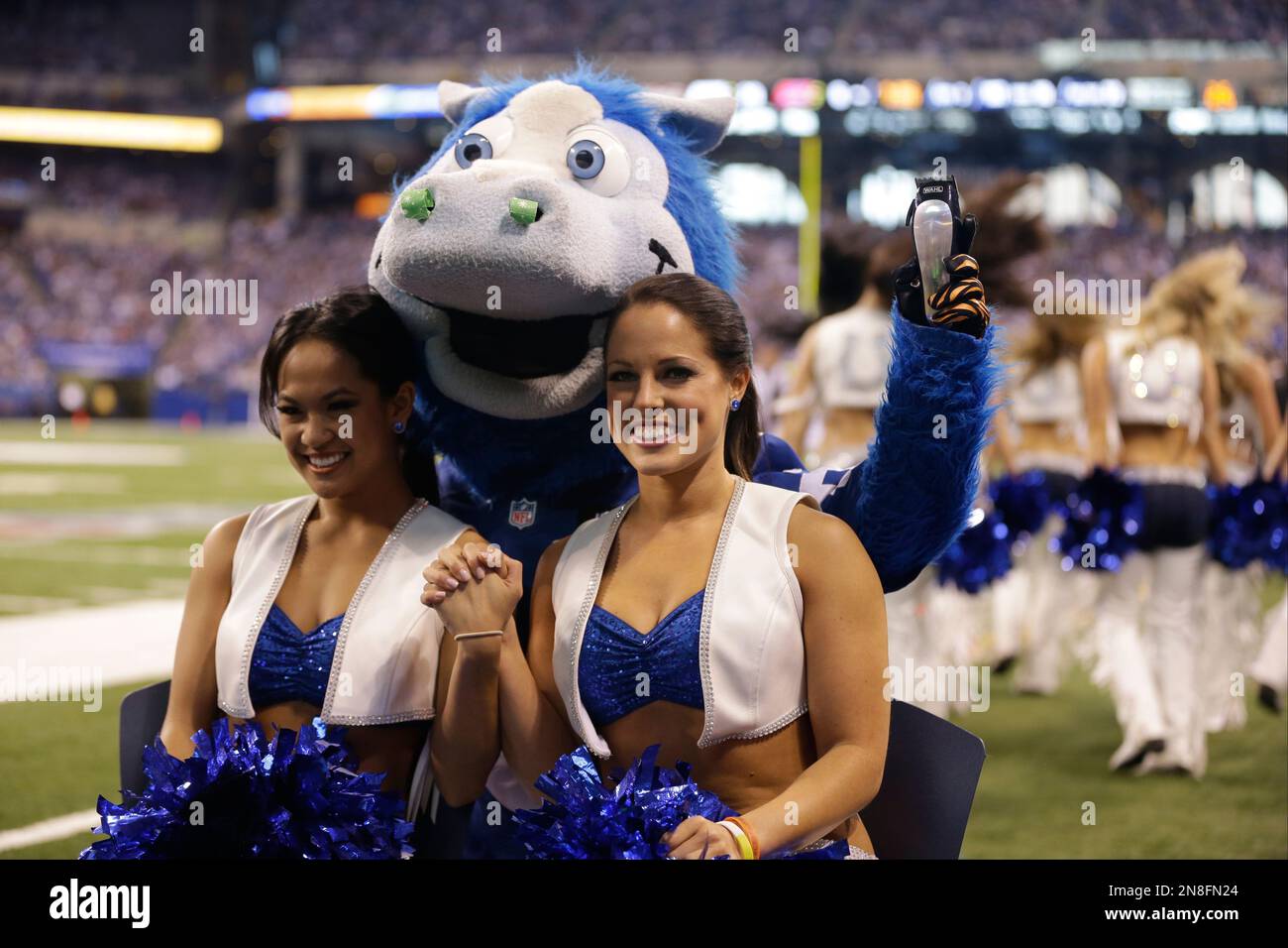 Indianapolis Colts cheerleaders Crystal Ann, left, and Megan M. wait to ...