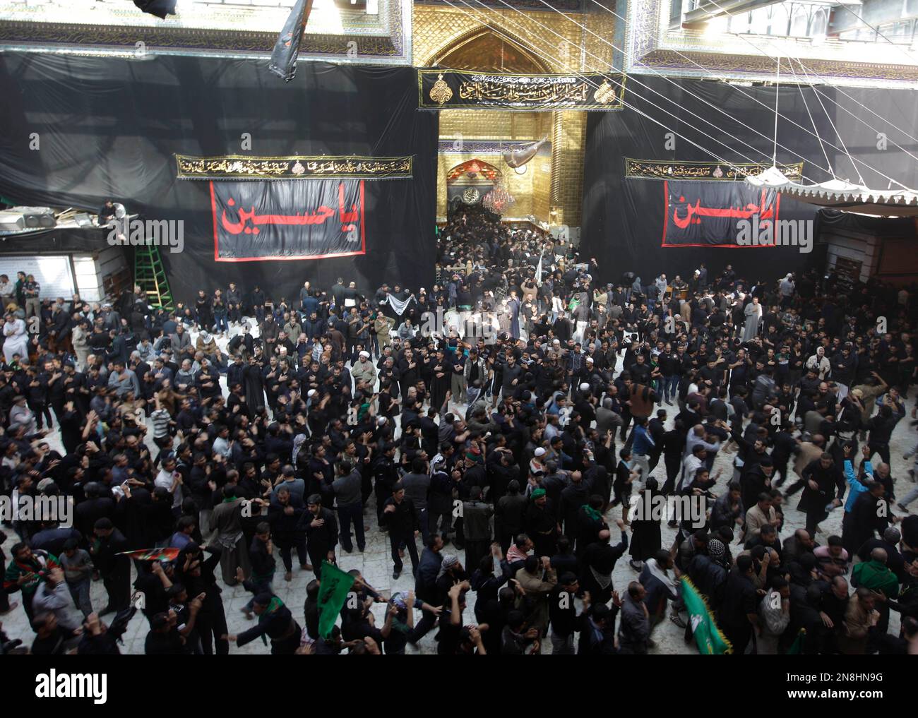 Shiite Muslim worshippers gather inside the holy shrine of Imam Abbas ...